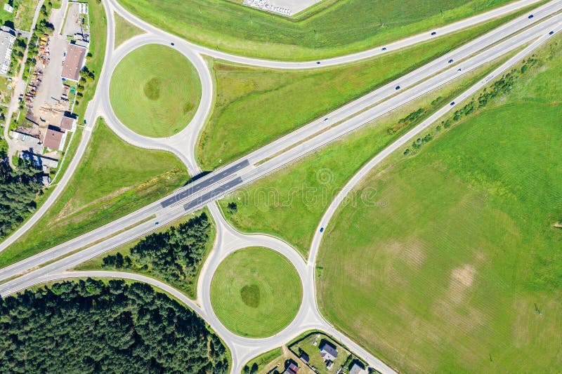 Aerial Top View of Suburb Road Intersection and Green Fields in Summer ...