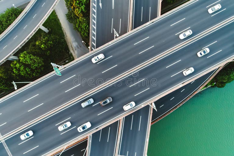 Aerial of Vehicles Navigate a Complex Highway System, Showcasing ...