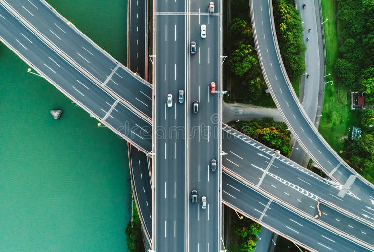 Aerial of Vehicles Navigate a Complex Highway System, Showcasing ...