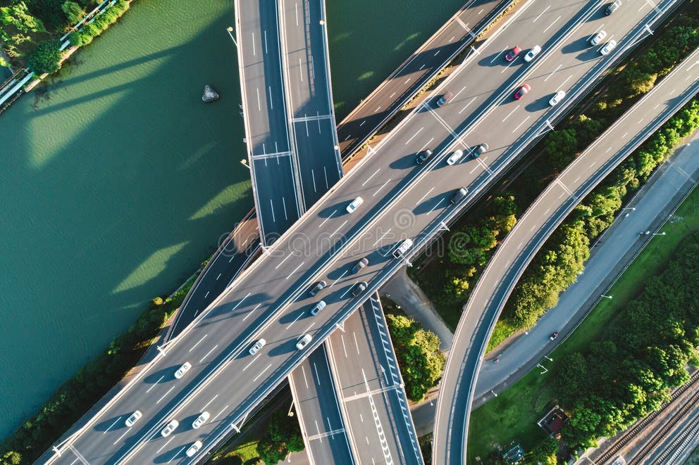Aerial of Vehicles Navigate a Complex Highway System, Showcasing ...