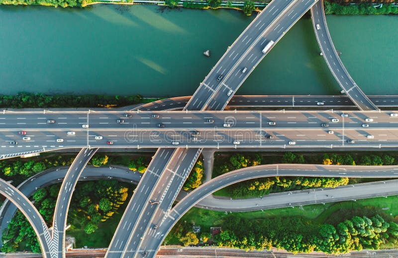 Aerial of Vehicles Navigate a Complex Highway System, Showcasing ...