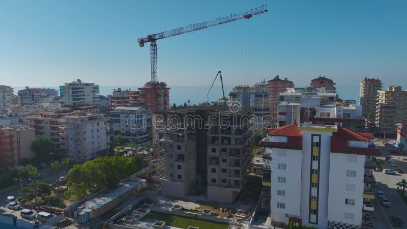 Aerial Video: Aerial View of a Multi-Level Construction Site with ...