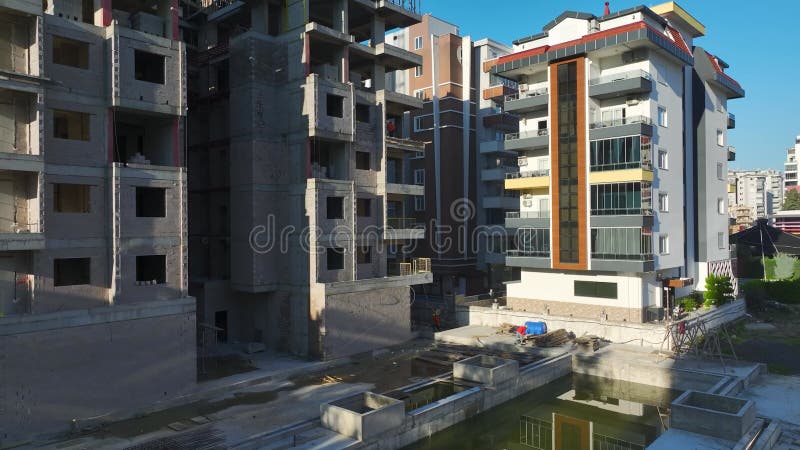 Aerial Video: Aerial View of Workers Using Cranes and Pouring Concrete ...