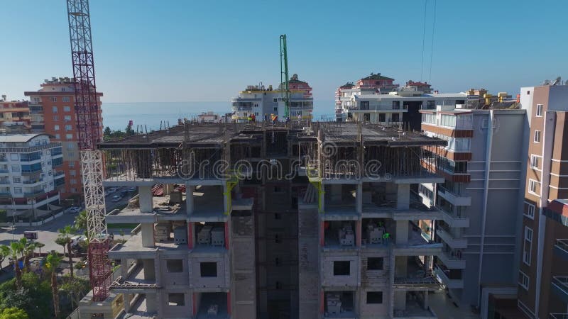 Aerial Video: Concrete Work in Progress on a Multi-Story Building with ...