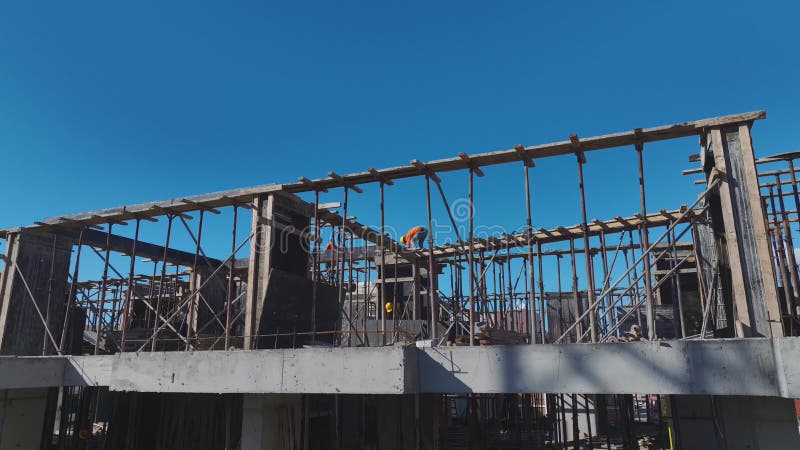 Aerial Video: Construction Progress on a Multi-Level Building with ...