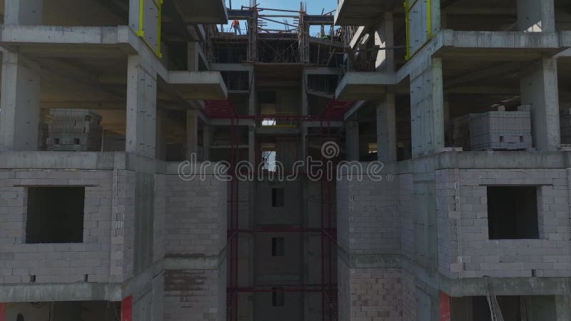 Aerial Video Construction Site with Cranes Moving Heavy Loads and ...