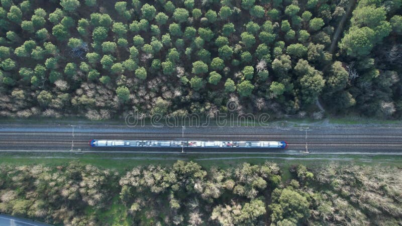 Aerial Video Footage of a Train Passing in a Natural Environment Stock ...