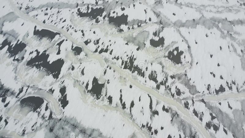 Aerial Video Showing the Complex Patterns of a Frozen Lake. the Natural ...