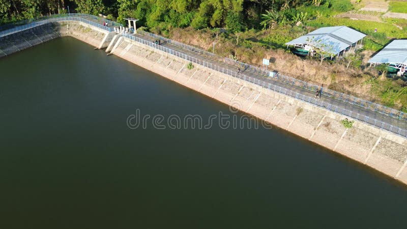 Aerial View of Symmetrical Water Reservoir Surrounded by Greenery and ...