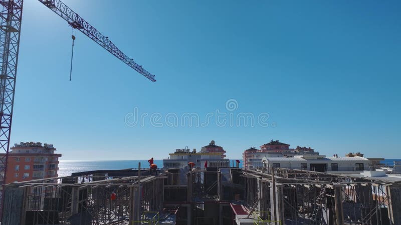 Aerial Video: Aerial View of a Multi-Level Construction Site with ...