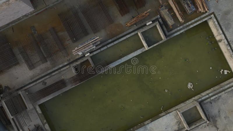 Aerial Video: Workers Installing Metal Framework and Walls while ...