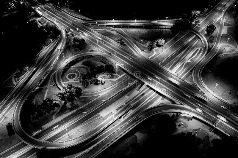 Aerial View Above of Busy Highway Road Junctions at Night. the ...
