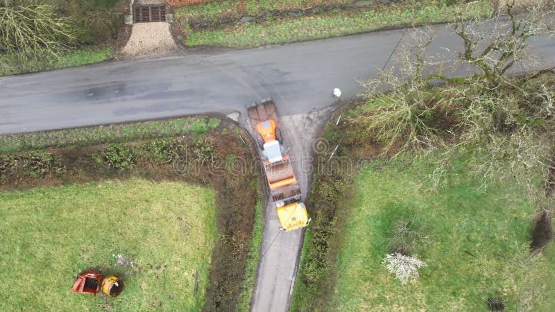 Aerial View of an Active Construction Site with Machinery Surrounded by ...