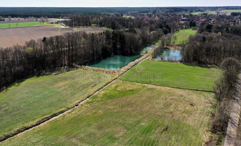 Aerial View of an Agricultural Meadow with Two Rectangular Fish Ponds ...