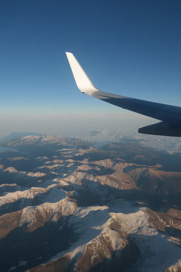 Aerial View of Aircraft Wing Over Landscape Stock Photo - Image of ...