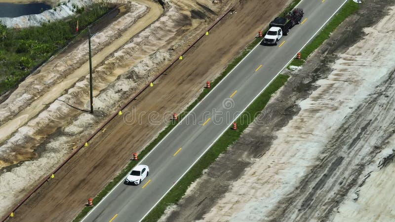 Aerial View of American Highway Under Construction with Moving Traffic ...