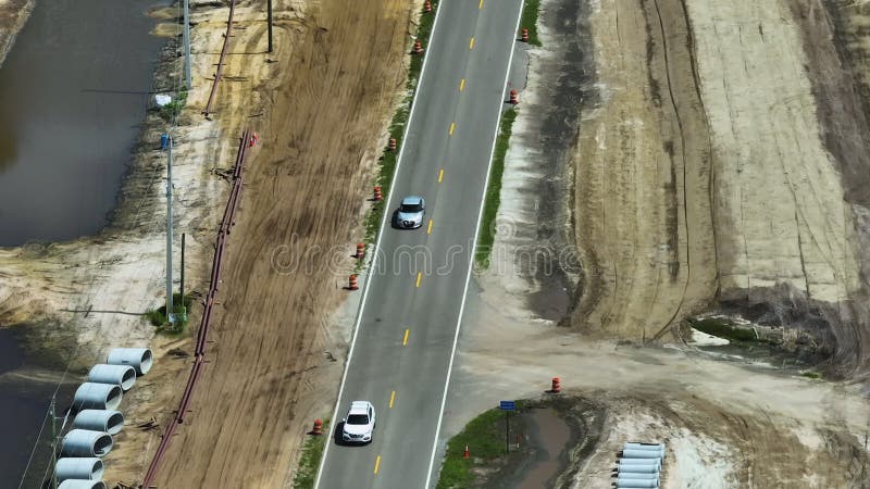 Aerial View of American Highway Under Construction with Moving Traffic ...