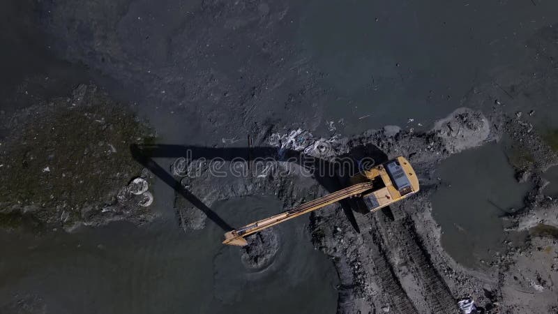 Aerial View of Backhoe Working on the Mud for Solve Pollution Problems ...