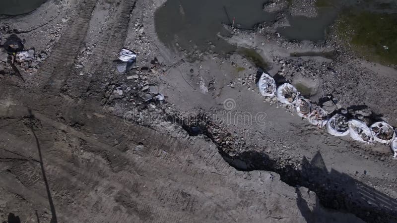 Aerial View of Backhoe Working on the Mud for Solve Pollution Problems ...