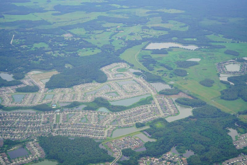 Aerial View of Beautiful House, Pond, Forest and Community in Florida ...