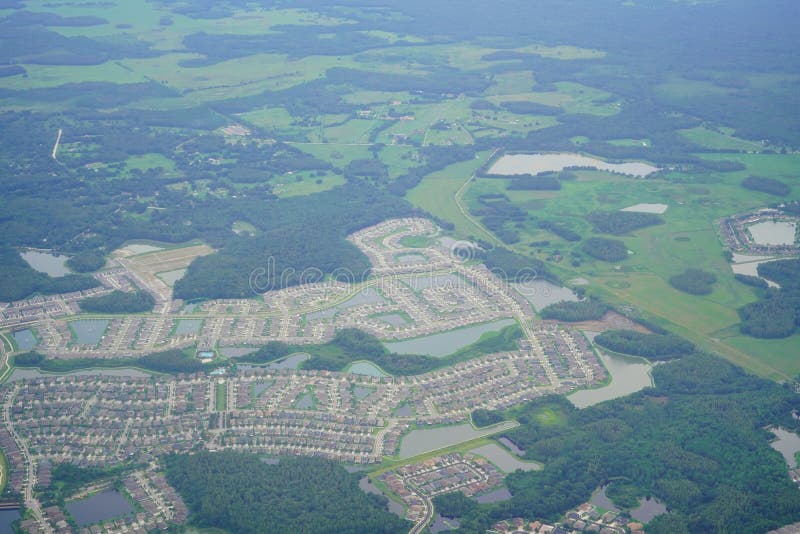 Aerial View of Beautiful House, Pond, Forest and Community in Florida ...