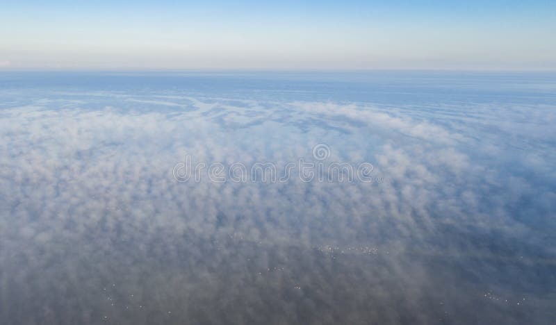 Aerial View of Beautiful White Clouds Over a Land Stock Photo - Image ...