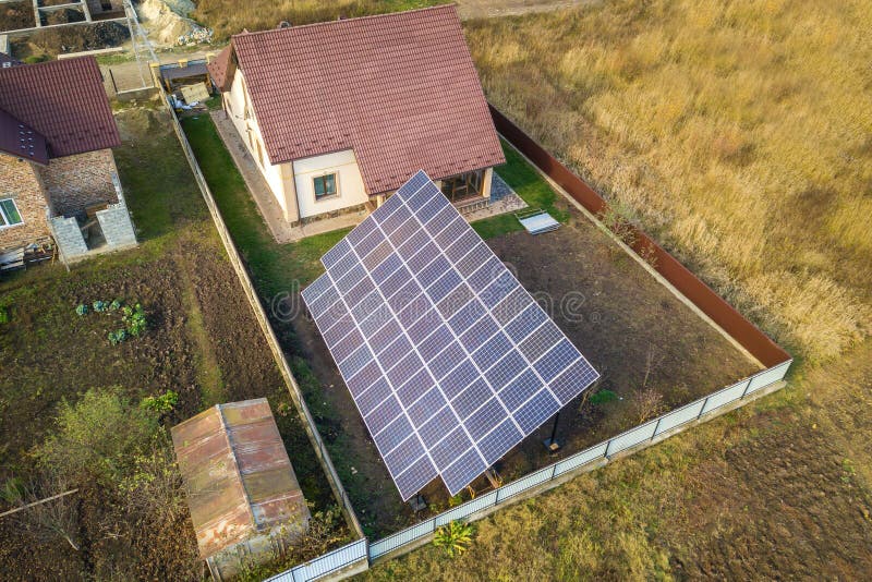 Aerial View of Big Blue Solar Panel Installed on Ground Structure Near ...