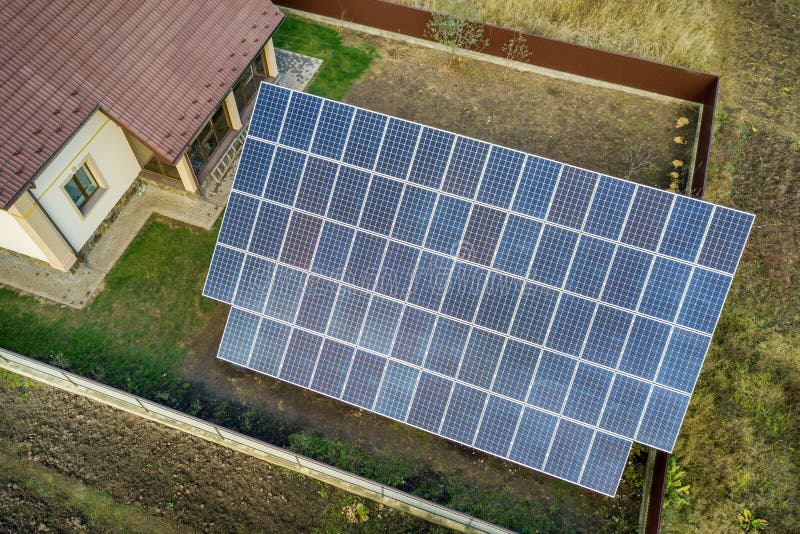 Aerial View of Big Blue Solar Panel Installed on Ground Structure Near ...