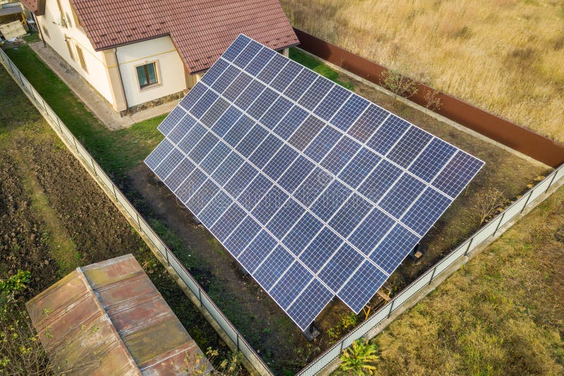 Aerial View of Big Blue Solar Panel Installed on Ground Structure Near ...