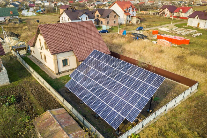 Aerial View of Big Blue Solar Panel Installed on Ground Structure Near ...