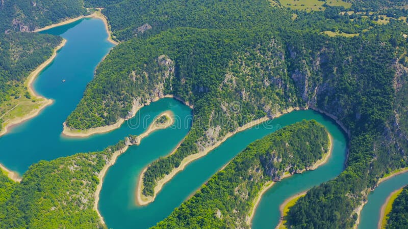 Aerial View Blue Bendy River Flowing through the Forest with Green ...