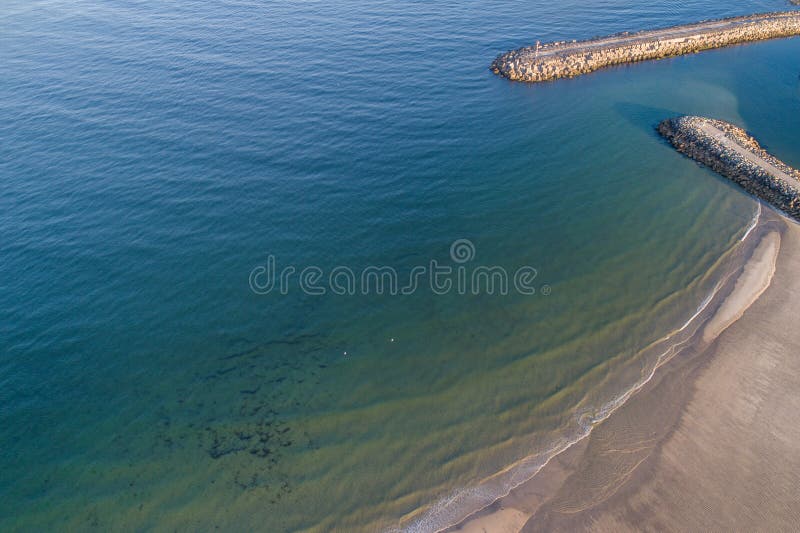 Aerial View of a Breakwater in a Calm Sea Stock Photo - Image of aerial ...