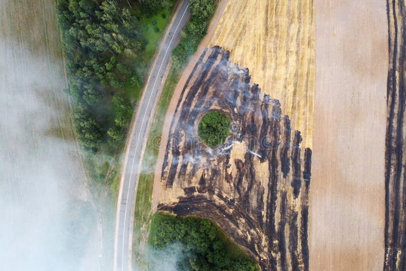 Aerial View of Burning Field with Smoke and Road Stock Photo - Image of ...