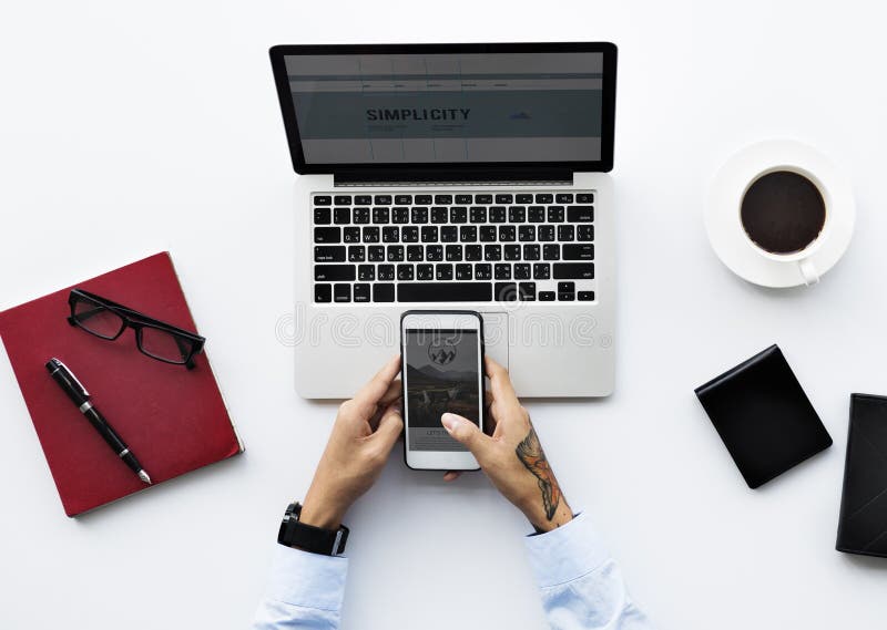 Aerial View of Businessman Using Mobile Phone with Computer Laptop ...