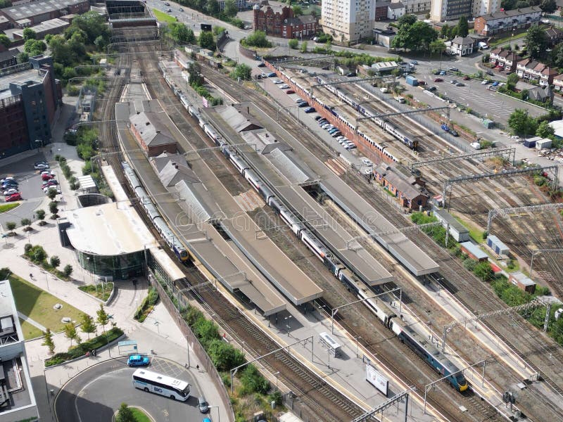 Aerial View of a Bustling Train Station with Multiple Platforms. Stock ...