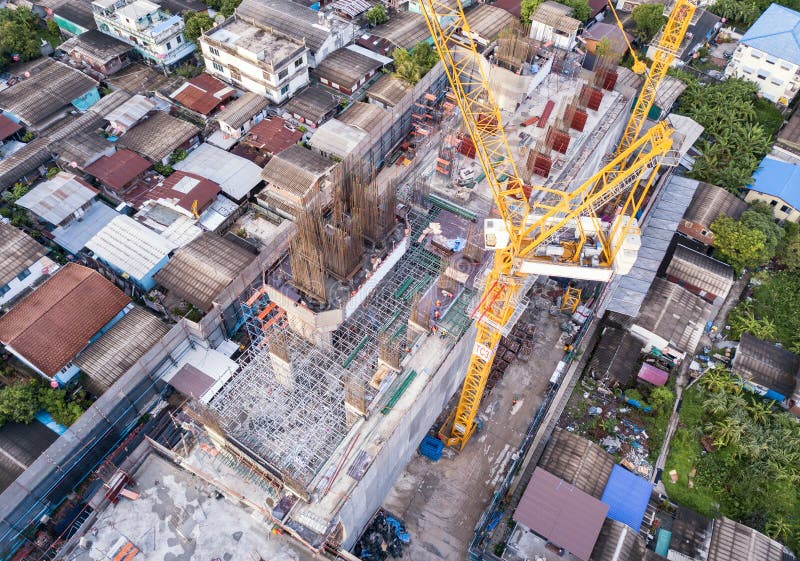 Aerial View of Busy Industrial Construction Site Workers with Cranes ...