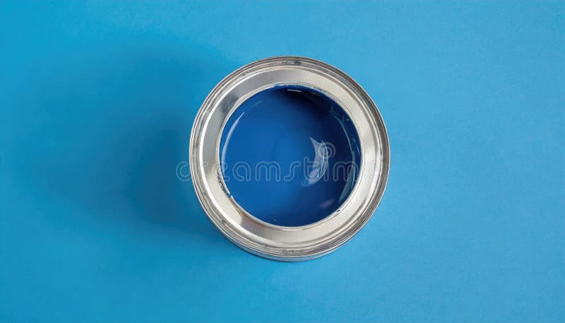 Ariel View of a Can of Blue Paint Against a Strong Blue Background ...