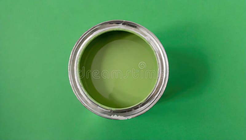 Ariel View of a Can of Green Paint Against a Strong Green Background ...