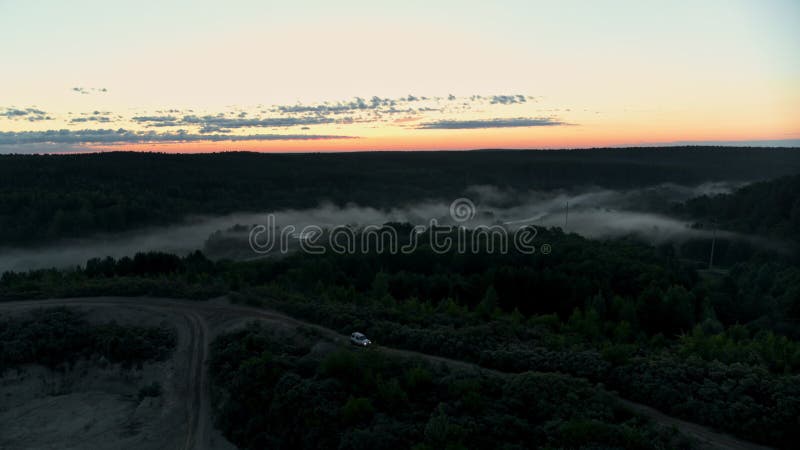 Aerial View of the Car Driving on a Sandy Road Stock Footage - Video of ...