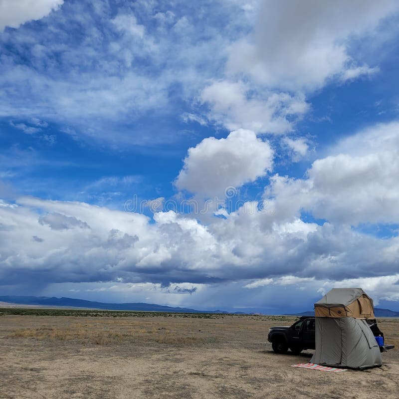 Aerial View of Car with Tent Parked in Greenery Field Stock Photo ...