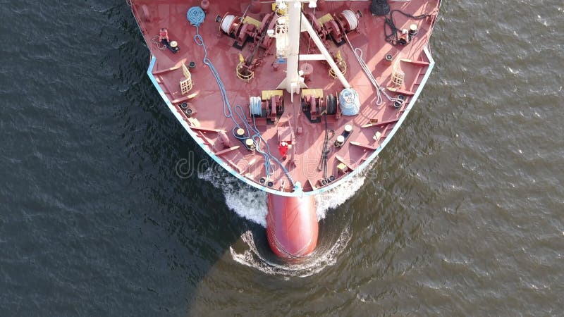 Aerial View of a Cargo Ships Bulbous Bow Cutting through the Water ...