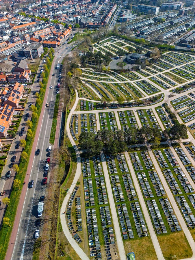 Aerial View of a Cemetery with Symmetrical Rows of Graves, a Central ...