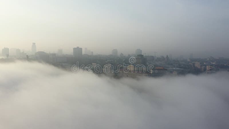 Aerial View of the City in the Fog. Stock Photo - Image of skyline ...