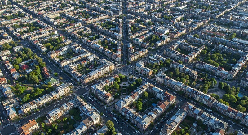 Aerial View of a Cityscape Featuring a Grid-like Pattern with Numerous ...