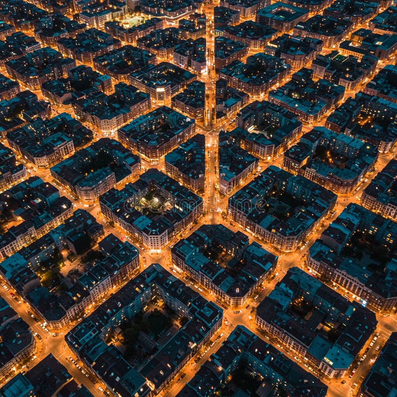 Aerial View of a Cityscape at Night with a Grid Pattern of Streets ...