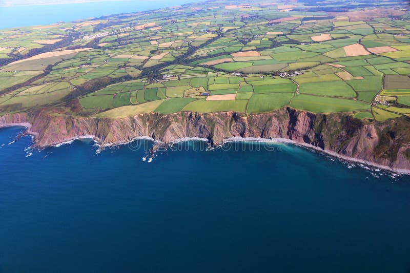 Red cliffs in Devon. stock photo. Image of headland, bedrock - 50289230