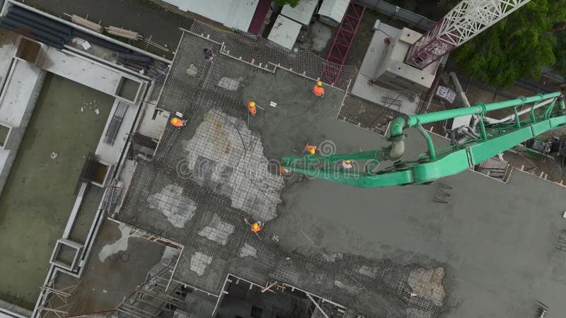 Aerial View: Concrete Pouring Progresses As Workers and Engineers ...