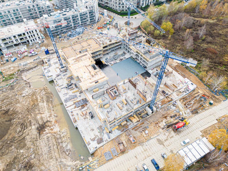 Aerial View of Construction Site with Crane and Building. Top View of ...