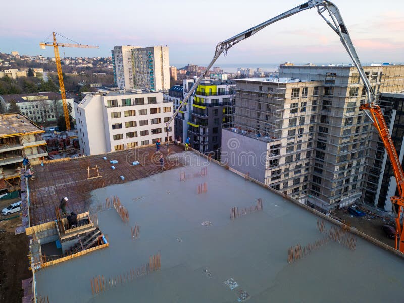 Aerial View of a Construction Site with a High-rise Building Under ...