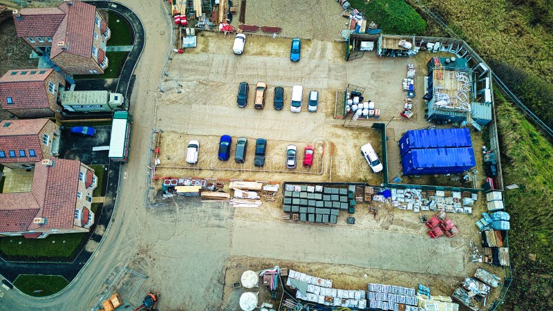 Aerial View of a Construction Site with Materials and Vehicles ...